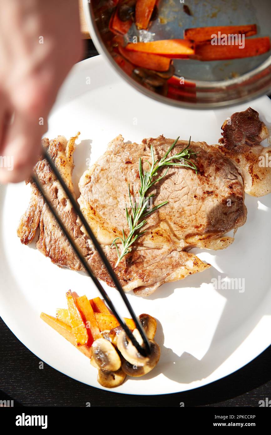 Man eating steak hi-res stock photography and images - Alamy