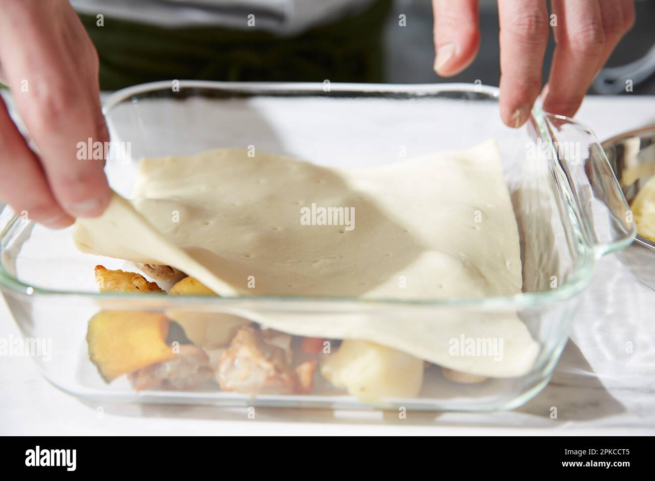 Person eating a meat pie hi-res stock photography and images - Alamy