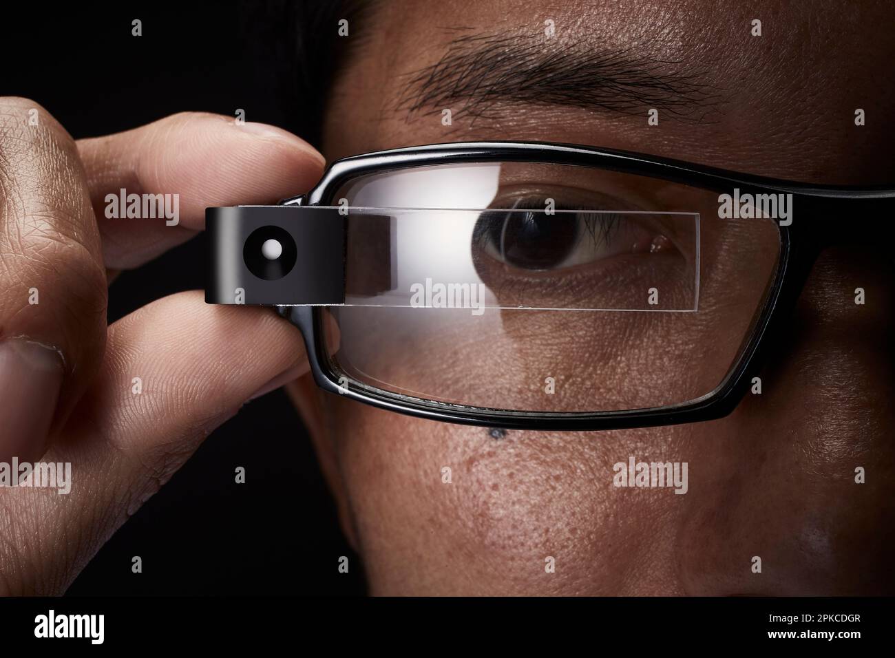 Man wearing Smart Glasses Stock Photo - Alamy