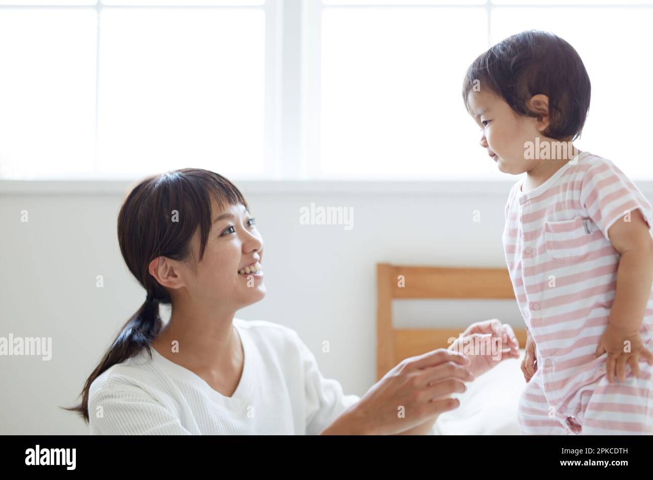Happy asian mother daughter watching hi-res stock photography and ...