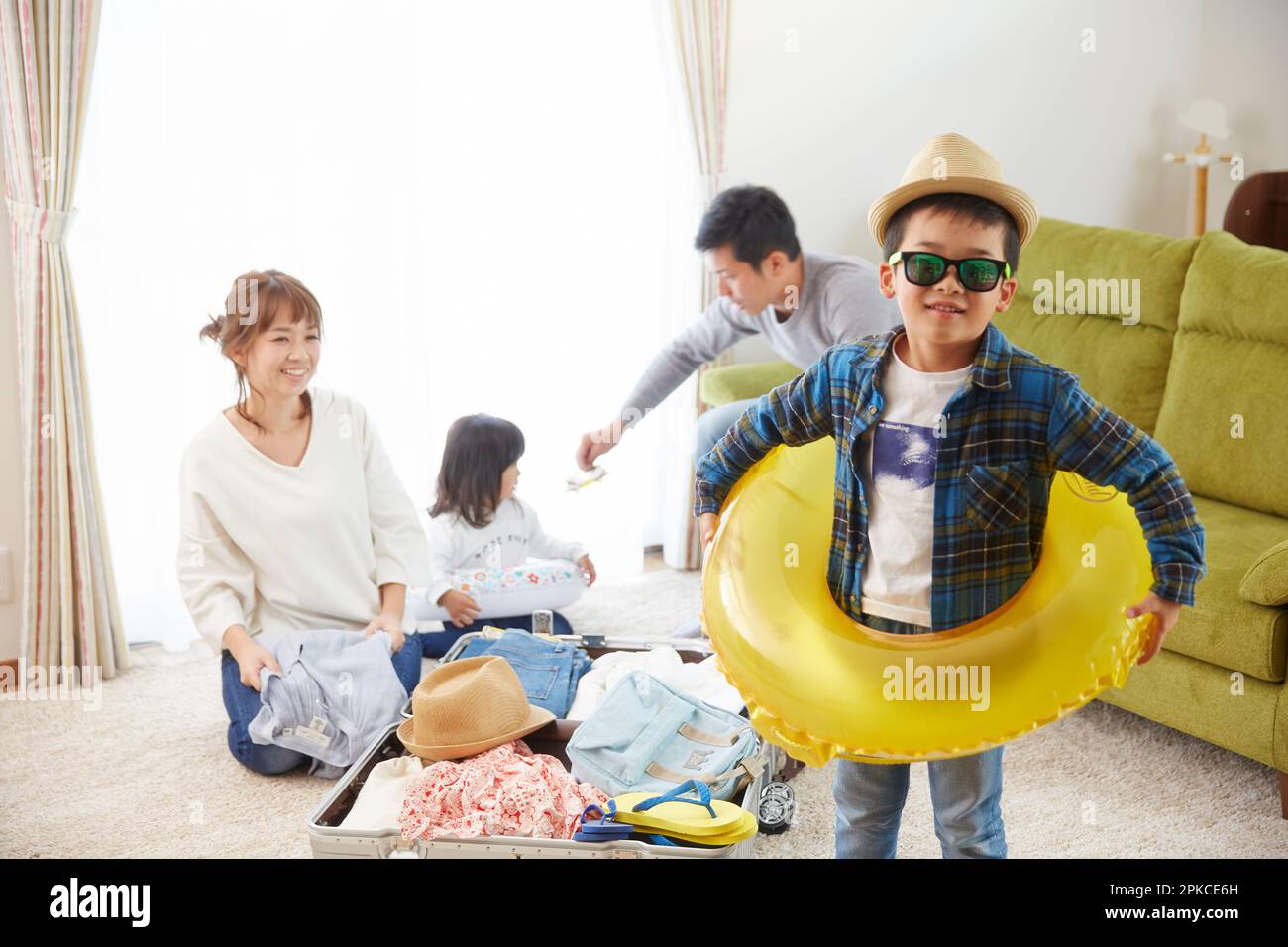 Family getting ready to go to the beach Stock Photo - Alamy