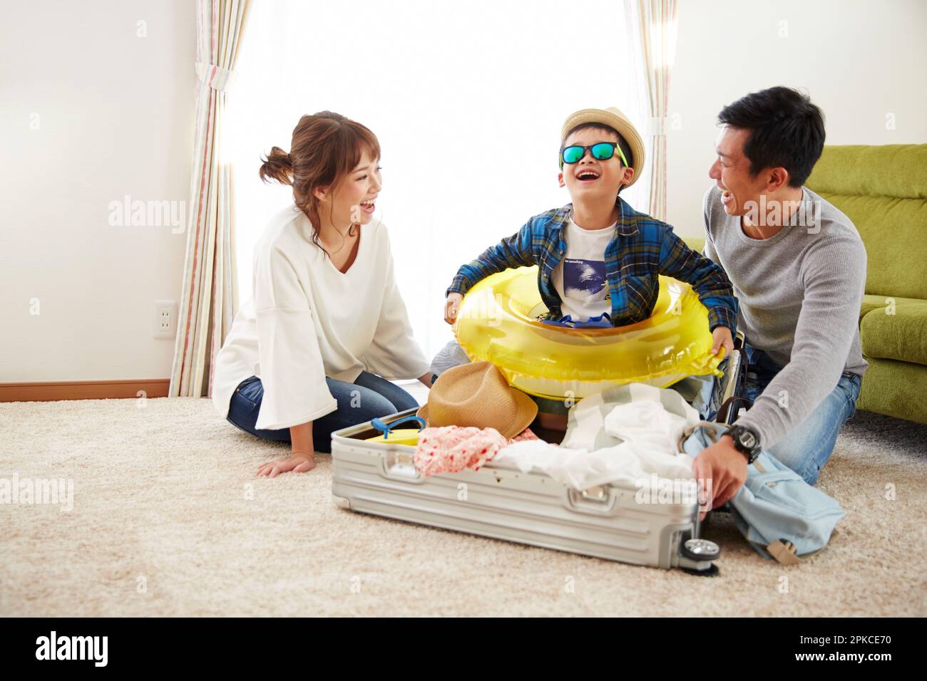 Family getting ready to go to the beach Stock Photo - Alamy