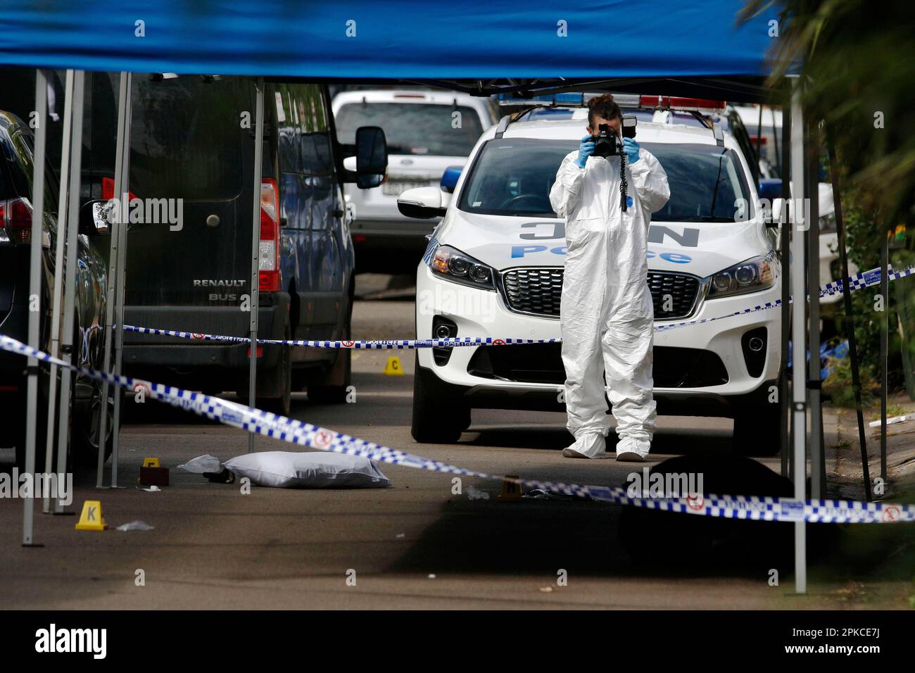 Forensic police at the scene of a police shooting, Newcastle, Friday ...