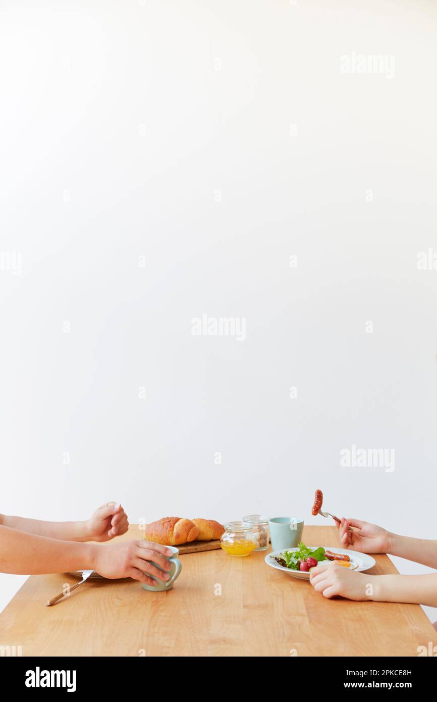 Breakfast set for two on the dining table Stock Photo - Alamy
