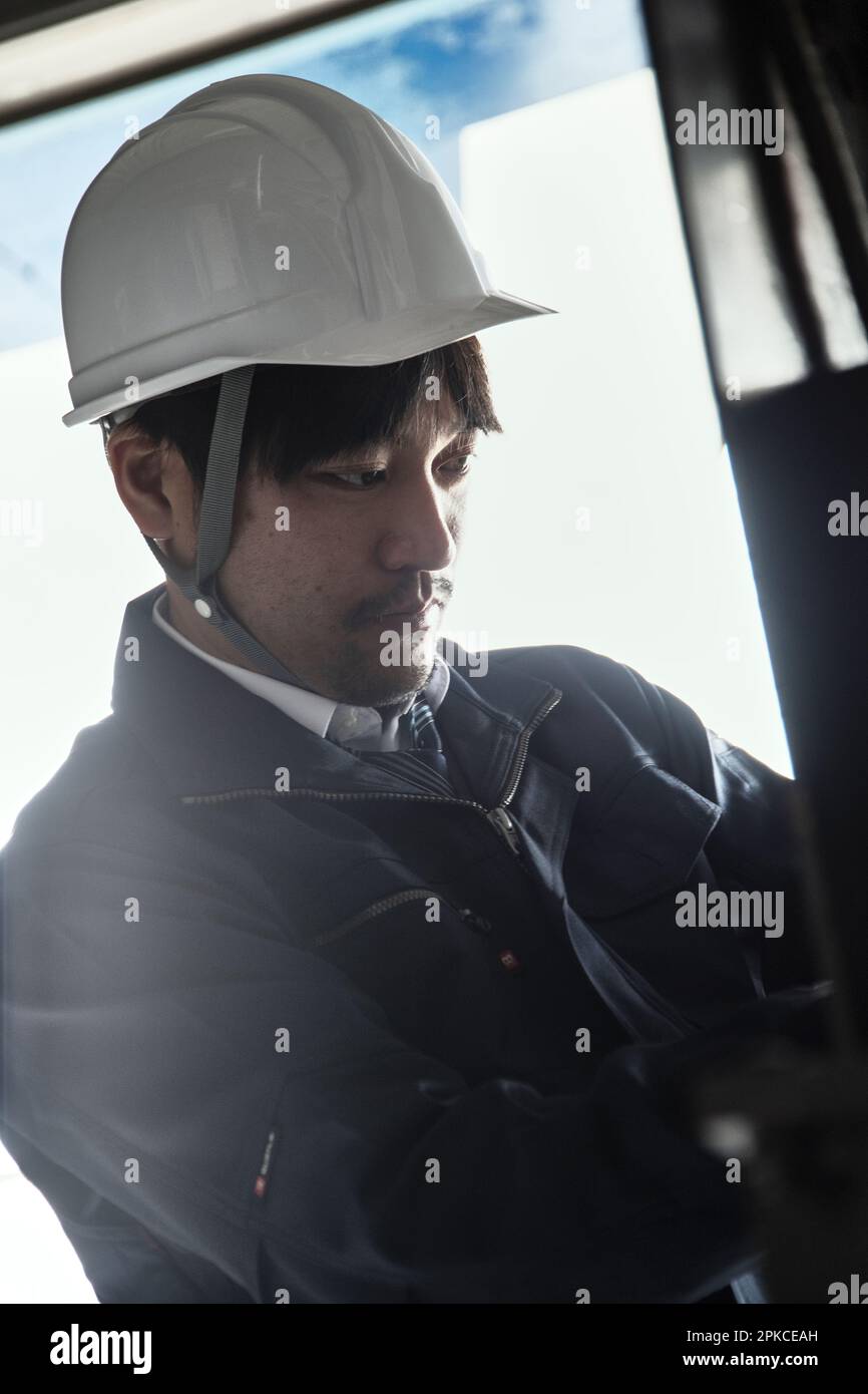 A man staring intently at something Stock Photo - Alamy