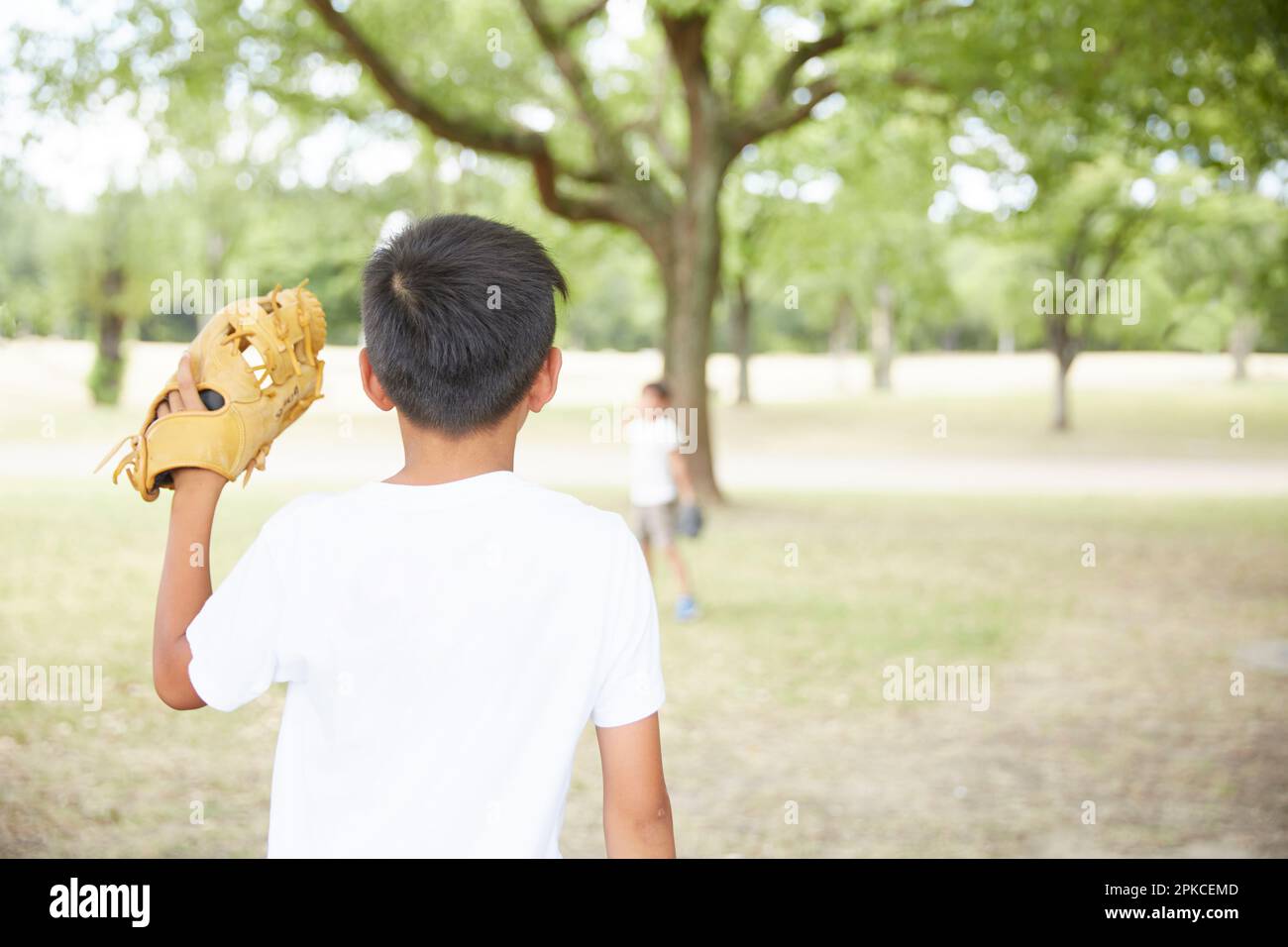 Back view of a boy with gloves on Stock Photo - Alamy