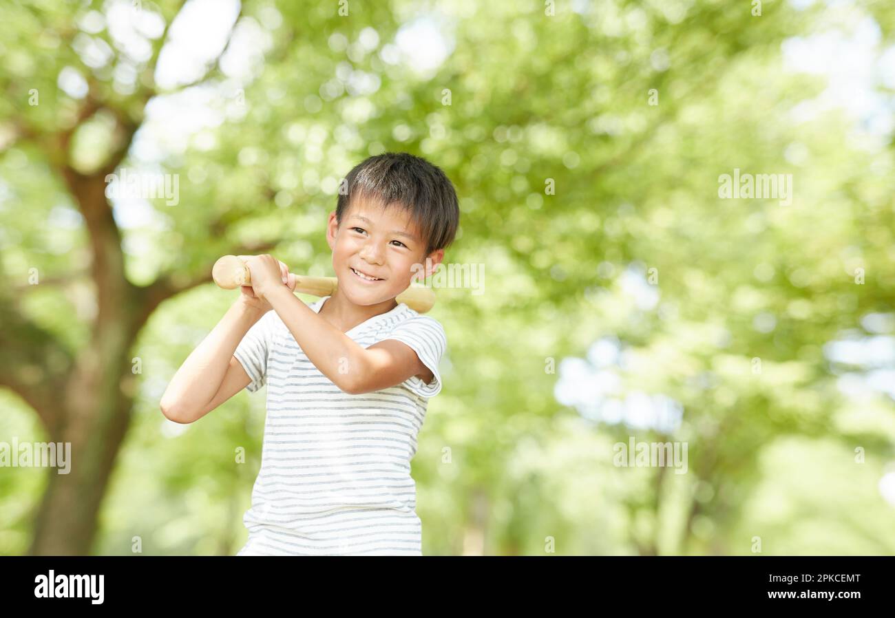 Boys with baseball bats Stock Photo - Alamy