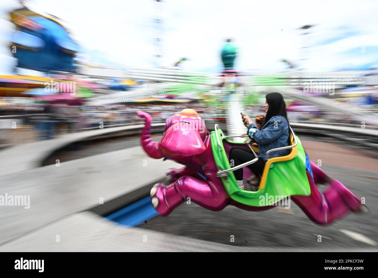 Patrons enjoy the carnival rides at the Sydney Royal Easter Show on ...