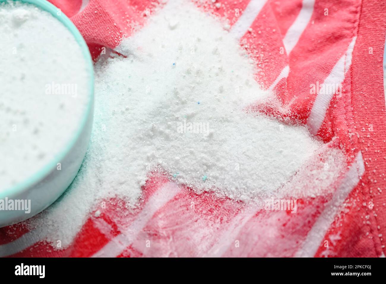 Laundry detergent on stained clothes, closeup Stock Photo - Alamy