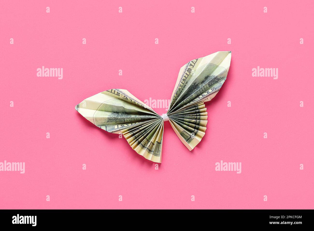 Origami butterfly made of dollar banknotes on pink background Stock ...