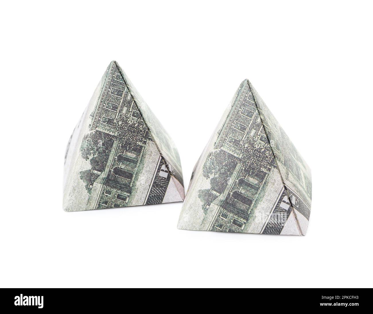 Origami pyramids made of dollar banknotes on white background Stock ...