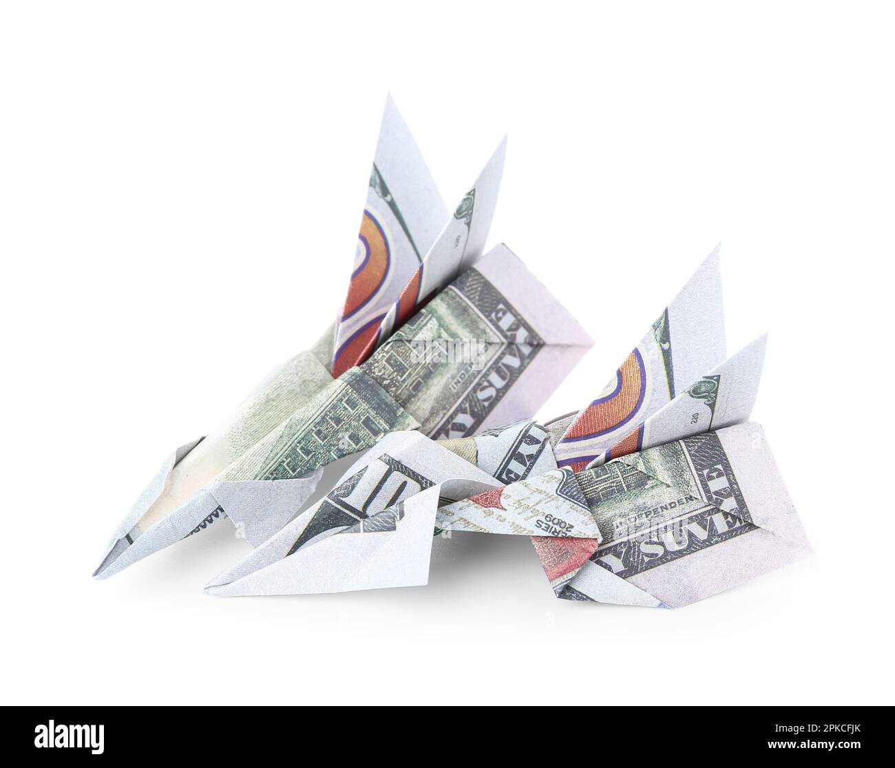 Origami airplanes made of dollar banknotes on white background Stock ...