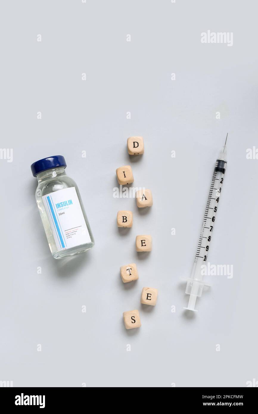 Word DIABETES with insulin and syringe on grey background Stock Photo ...