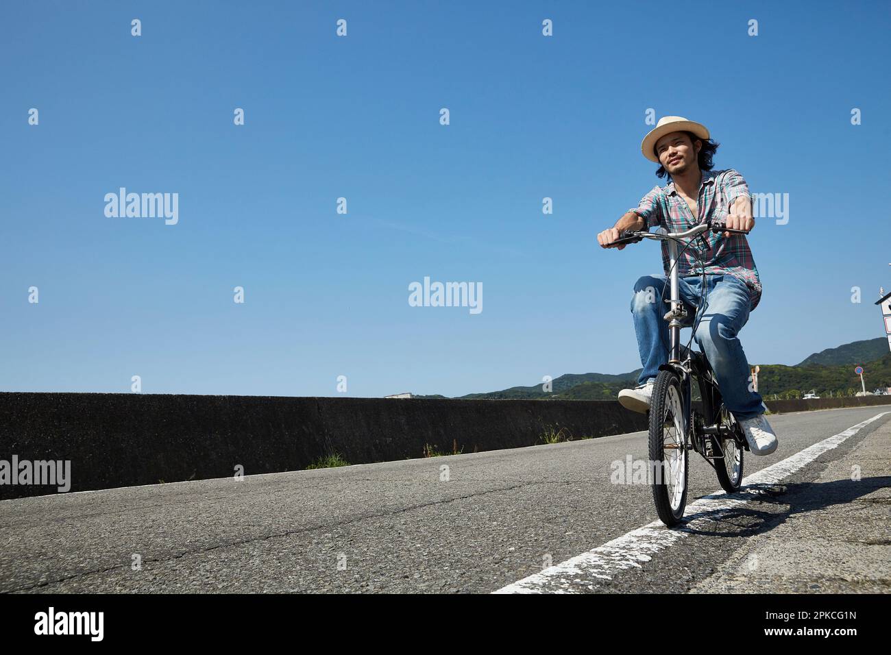 Person pedaling hi-res stock photography and images - Alamy