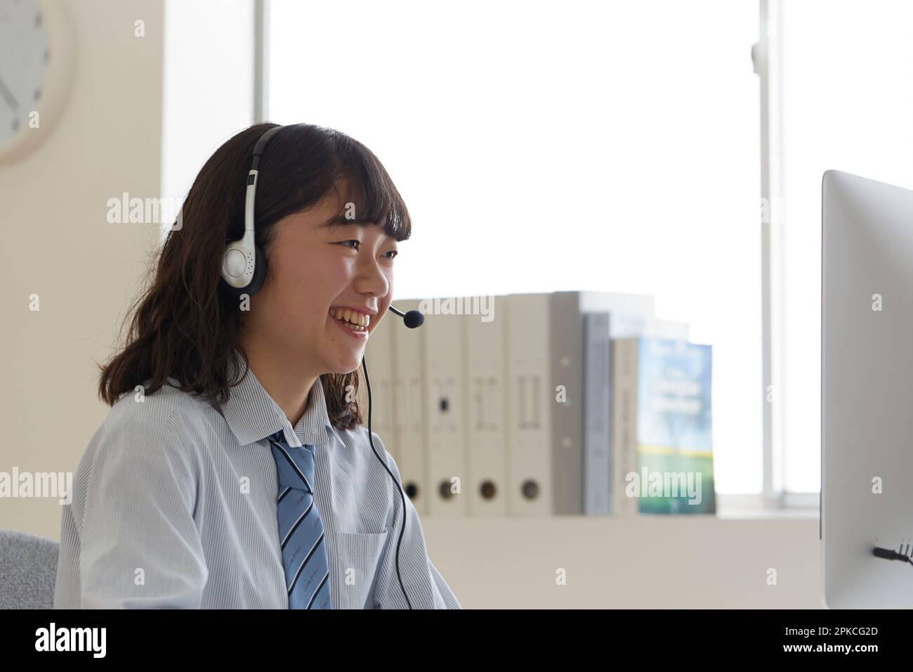 High school girl studying on a computer Stock Photo - Alamy