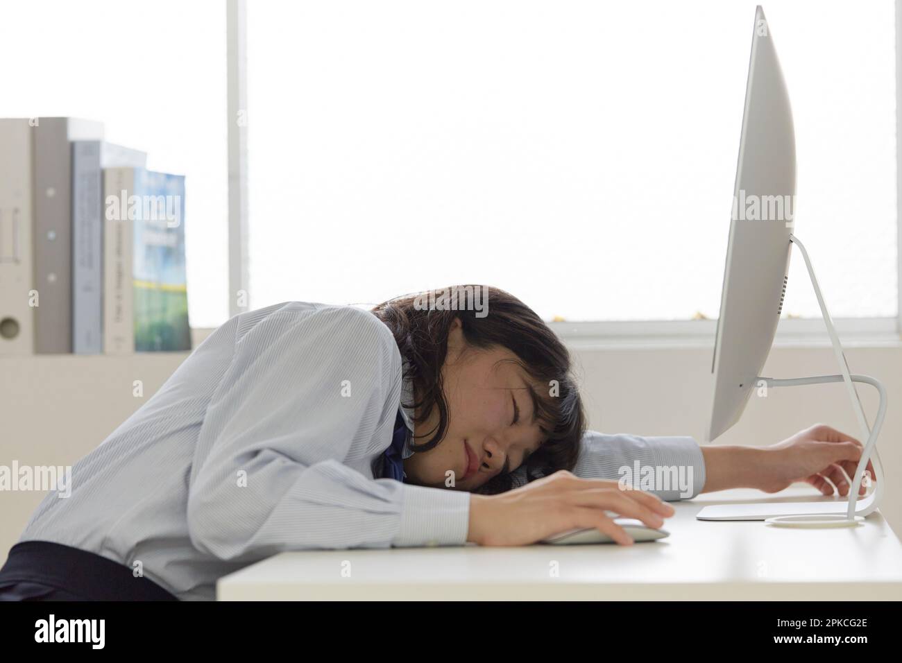 A high school girl dozing off in front of the computer Stock Photo - Alamy
