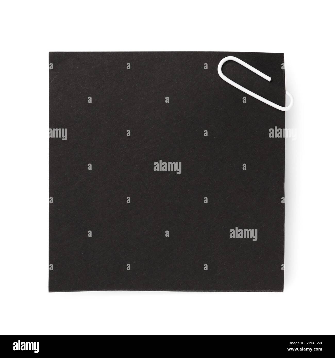 Black sticky note with paper clip on white background Stock Photo - Alamy
