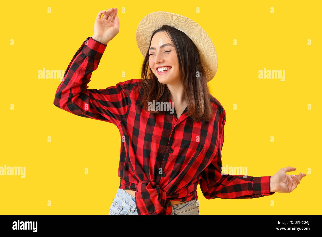 Young woman on yellow background. Festa Junina (June Festival ...