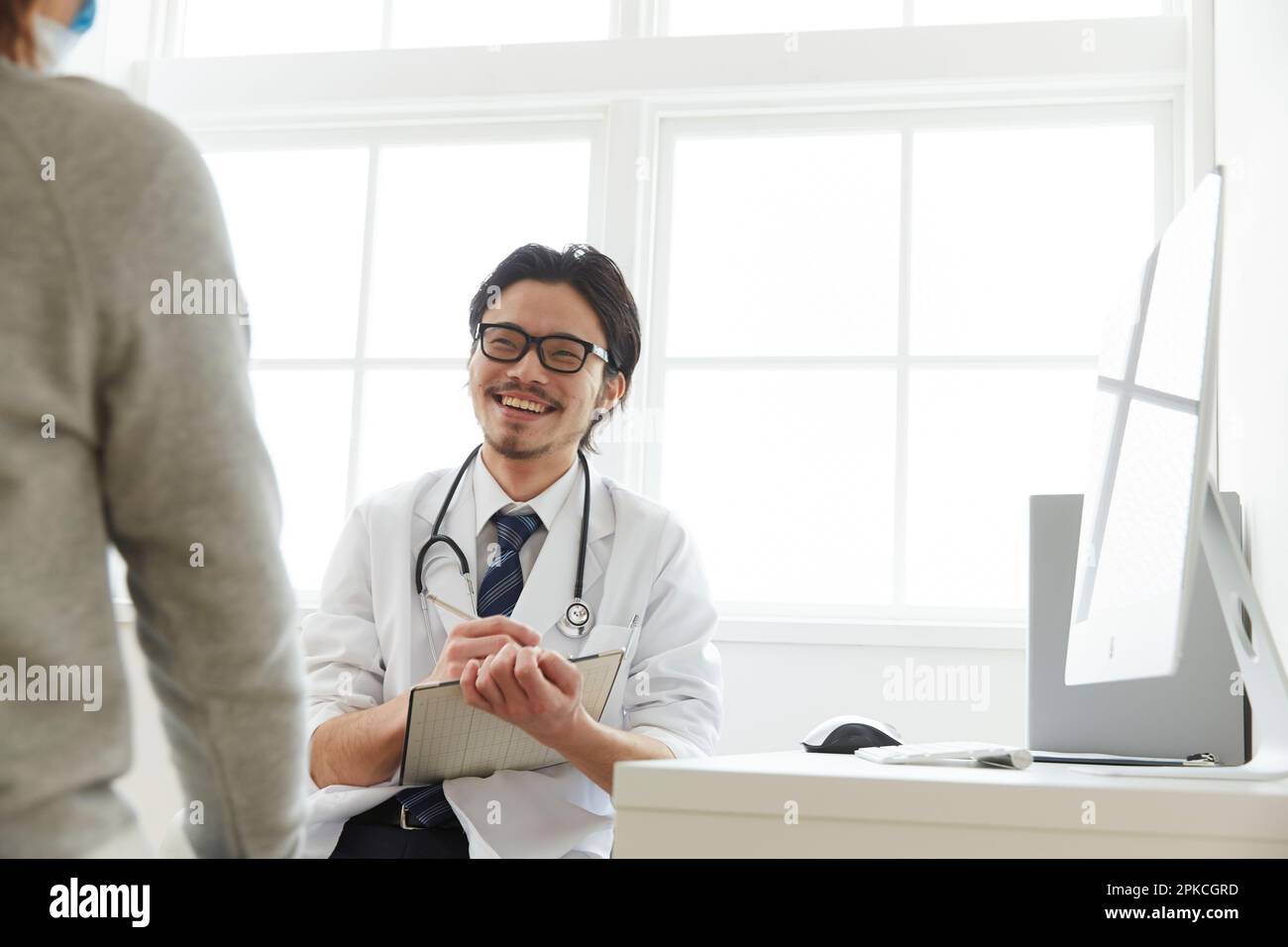 Medical examination by interview hi-res stock photography and images ...