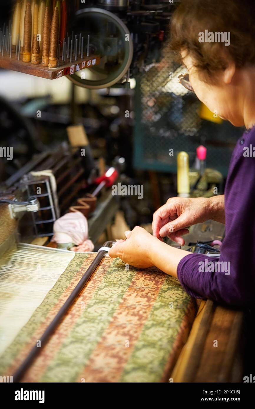 Nishijin weaving machine and craftsman Stock Photo - Alamy