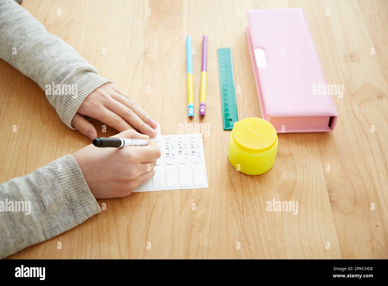 Child writing name hi-res stock photography and images - Alamy