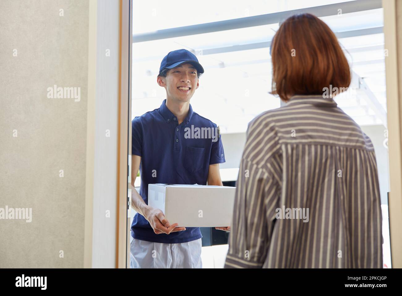 Delivery person takatsuki hi-res stock photography and images - Alamy