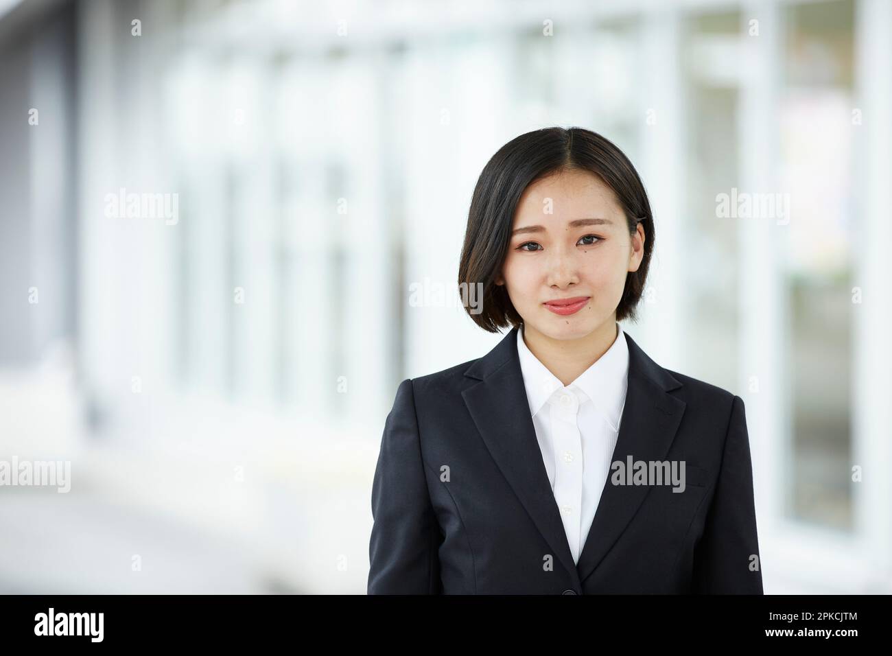 Young woman graduate standing outdoors hi-res stock photography and images - Alamy