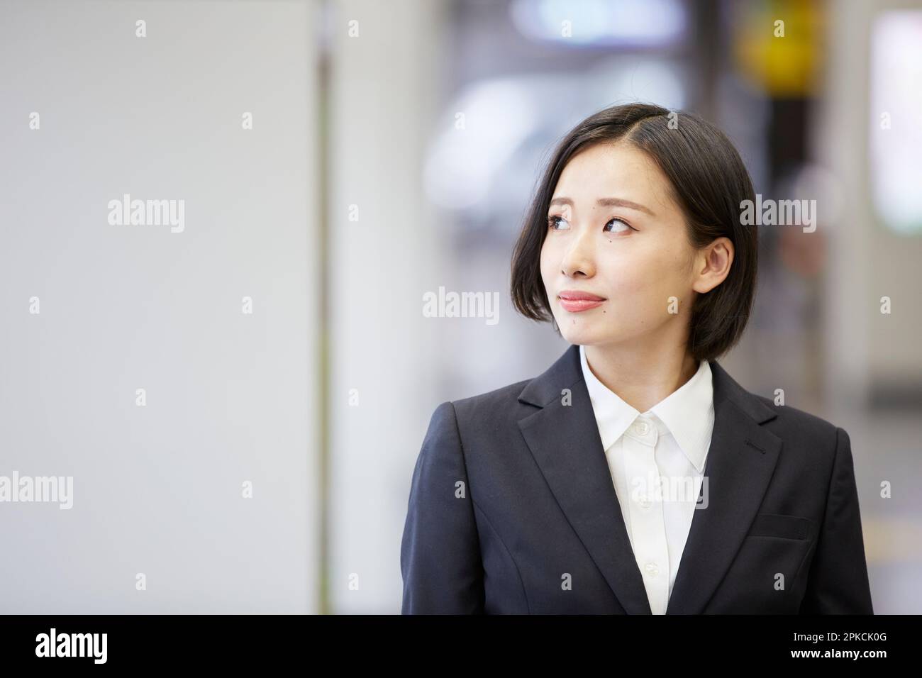 Woman in a Recruit Suit Stock Photo - Alamy