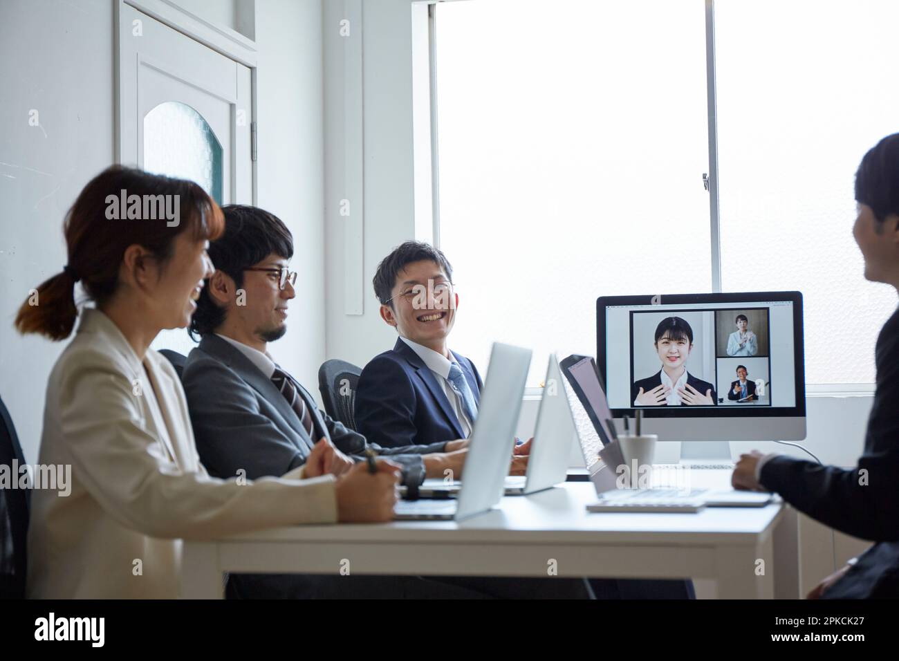 People having a remote meeting Stock Photo - Alamy