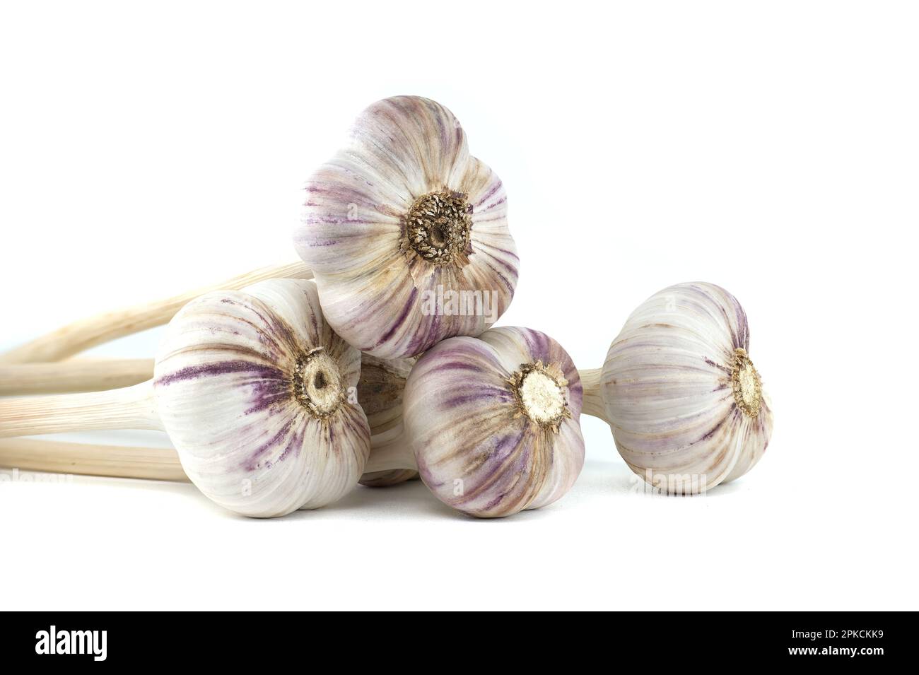 Garlic bulbs in close-up isolated on white background Stock Photo - Alamy