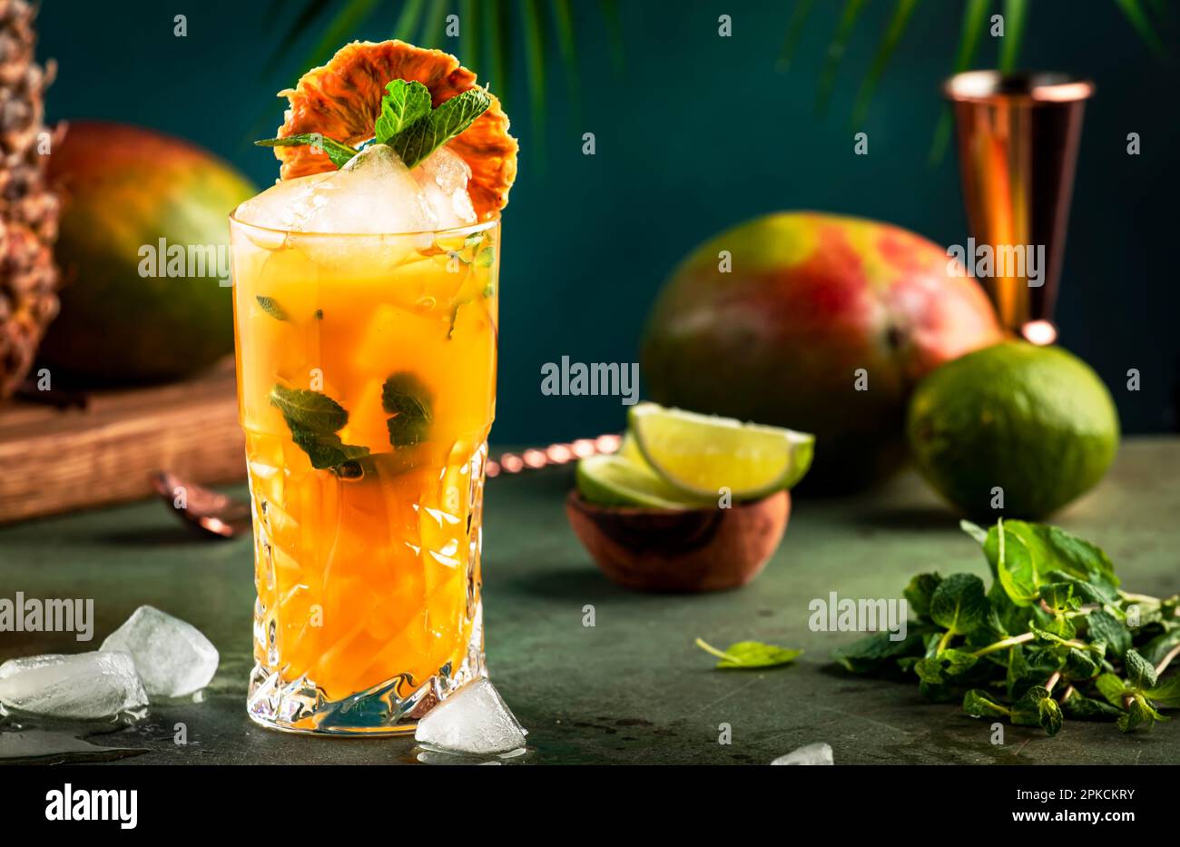 Alcoholic cocktail with vodka, pineapple juice, mango, liquor, ice ...