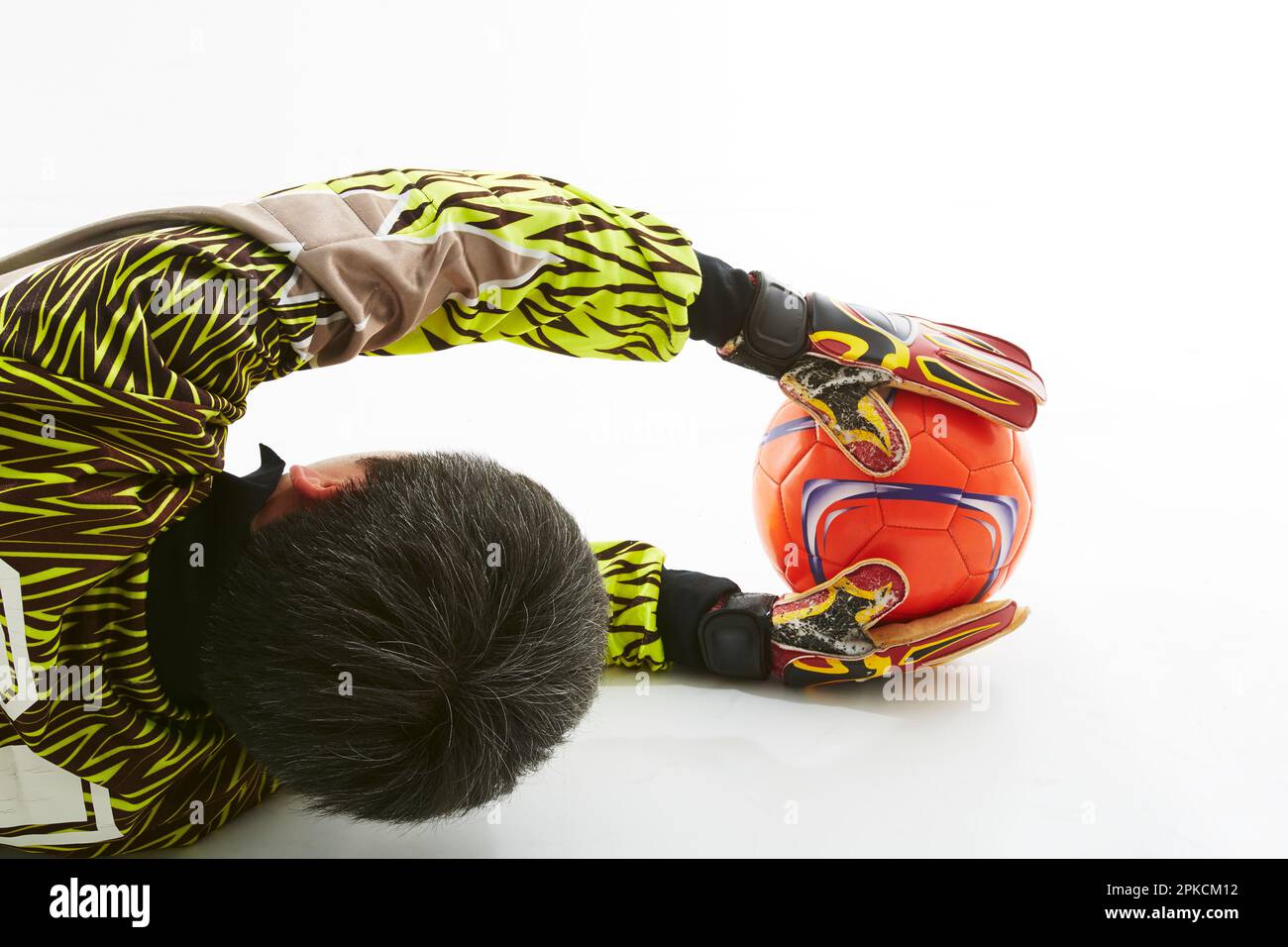 Goalkeeper stopping the ball Stock Photo - Alamy