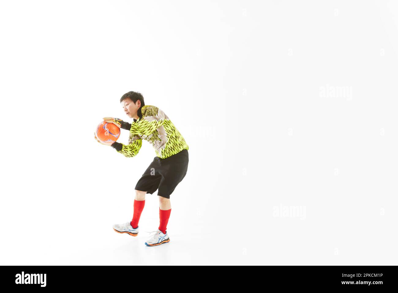 Goalkeeper stopping the ball Stock Photo - Alamy