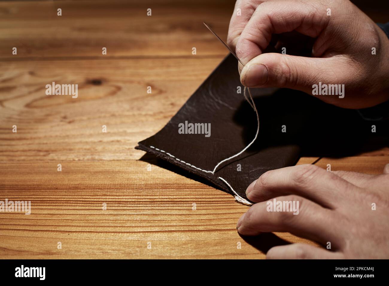 Hand sewing hi-res stock photography and images - Alamy