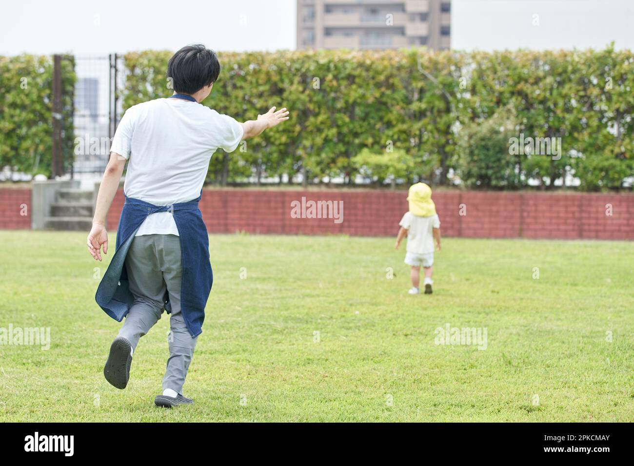 Man chasing child hi-res stock photography and images - Alamy