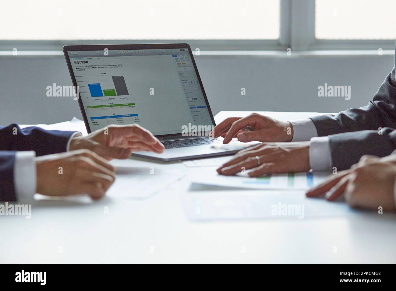 Three businessmen at work Stock Photo - Alamy