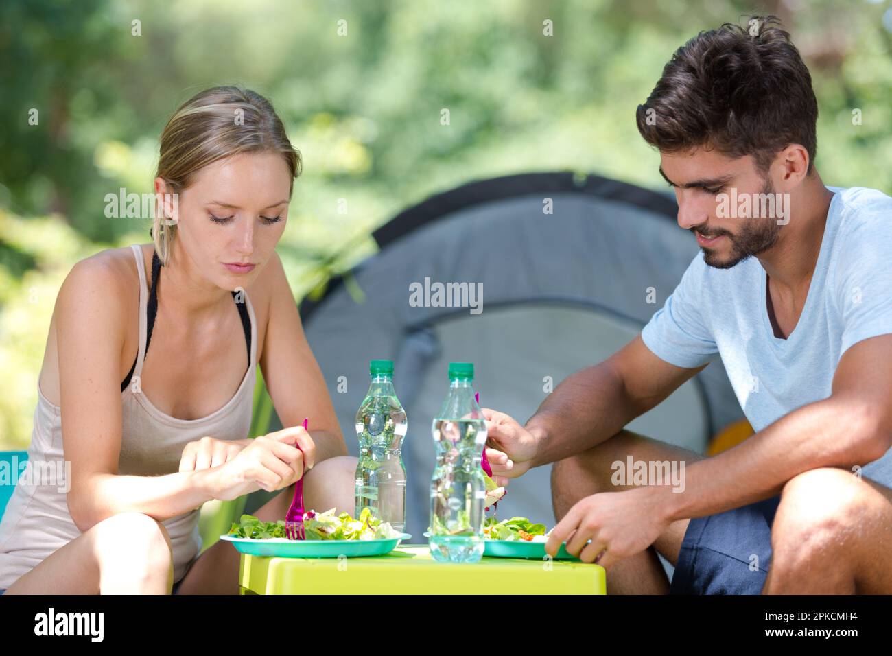 a sad couple camping together Stock Photo - Alamy