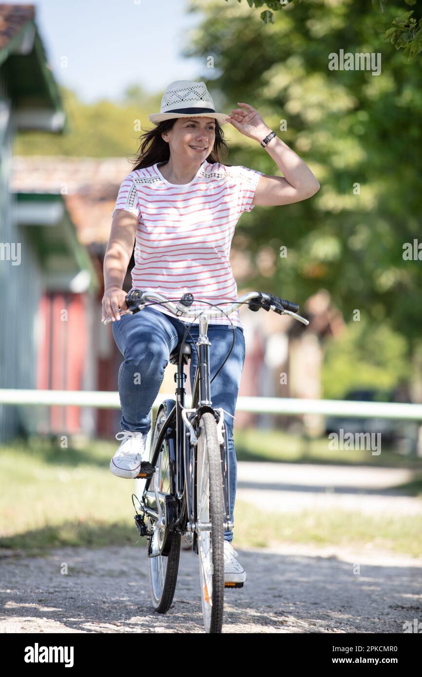Woman bike forest elderly hi-res stock photography and images - Alamy
