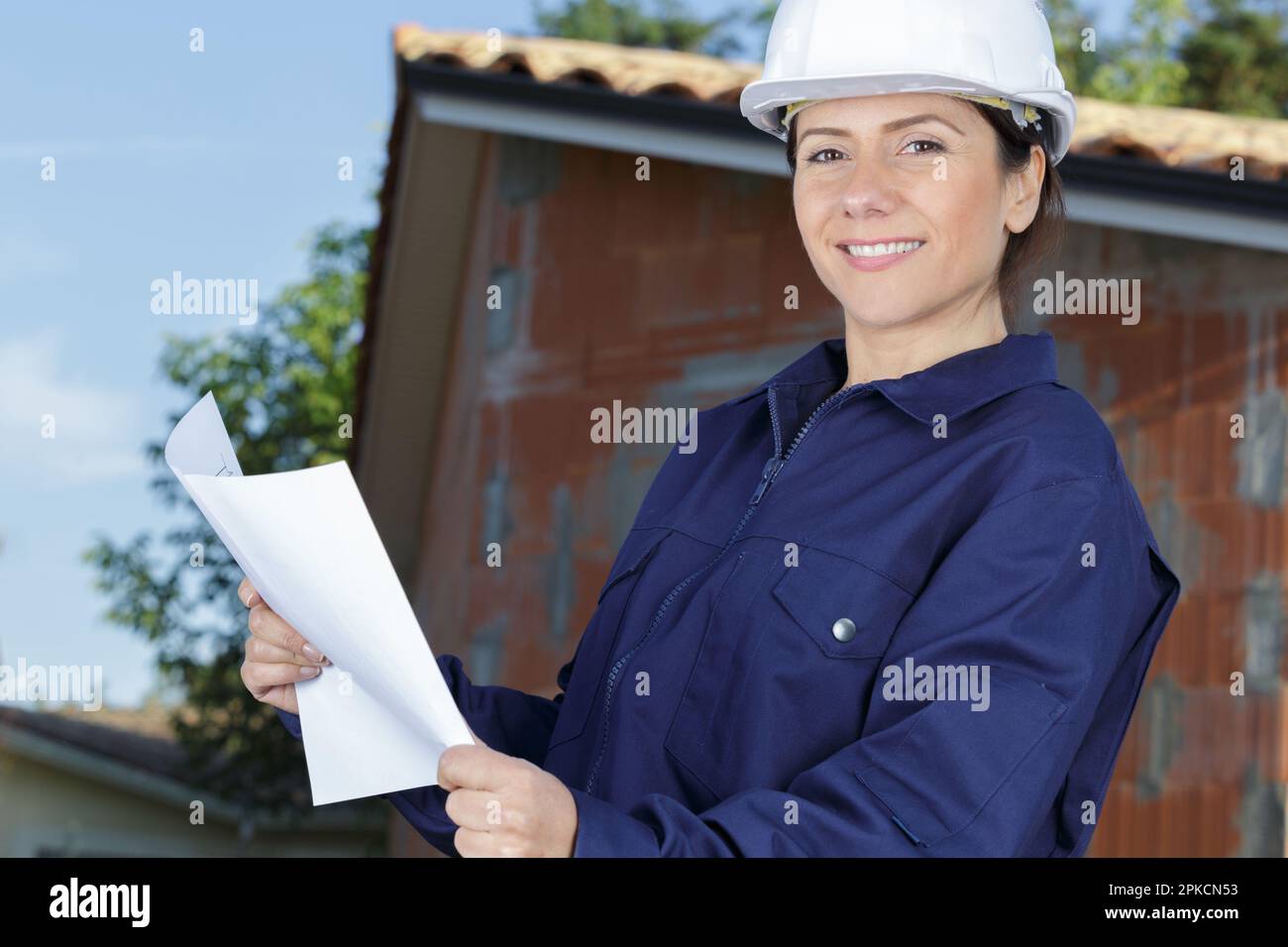 woman engineering on transportation site map Stock Photo - Alamy