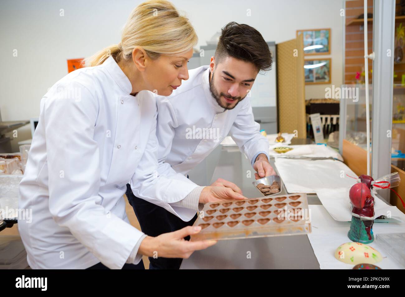 chocolate chef supervising workers chocolate Stock Photo - Alamy