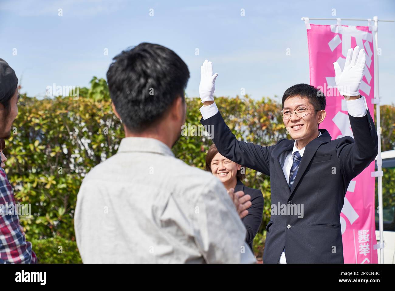 Japan suits crowd hi-res stock photography and images - Alamy