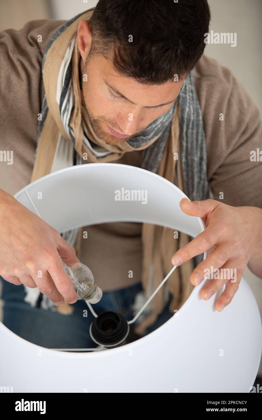 Changing lightbulb ladder hi-res stock photography and images - Alamy