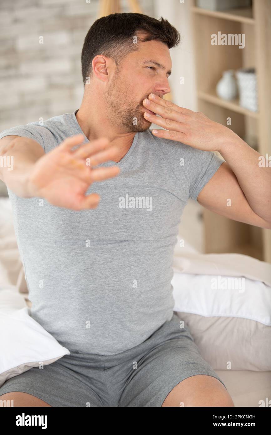 Happy man waking up after hi-res stock photography and images - Alamy
