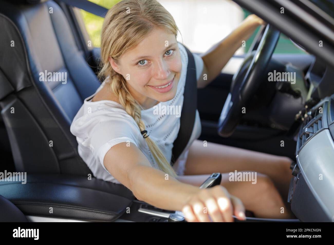 woman hand pulling handle to open car door from inside Stock Photo - Alamy