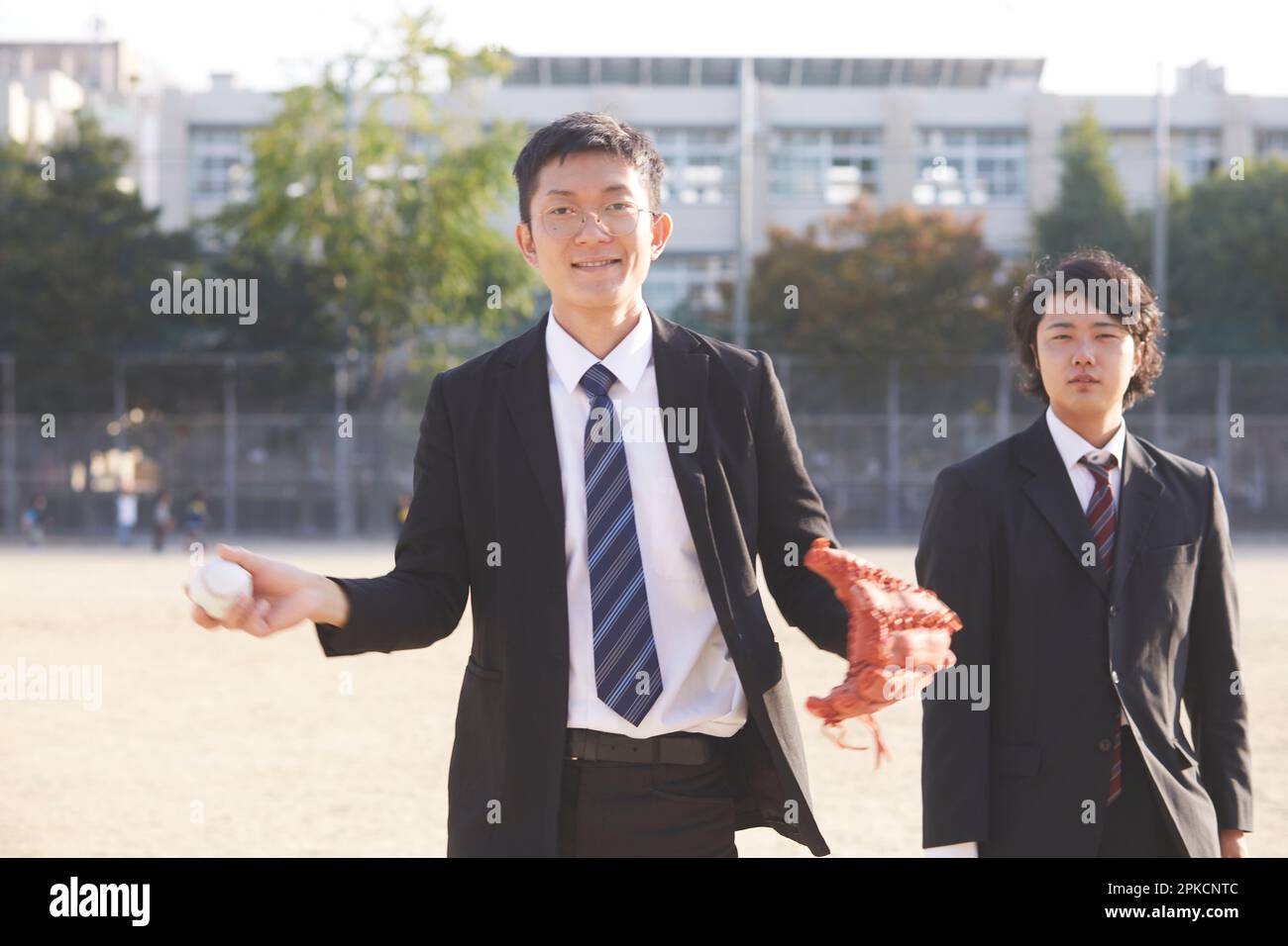 Two men in suits playing baseball Stock Photo - Alamy