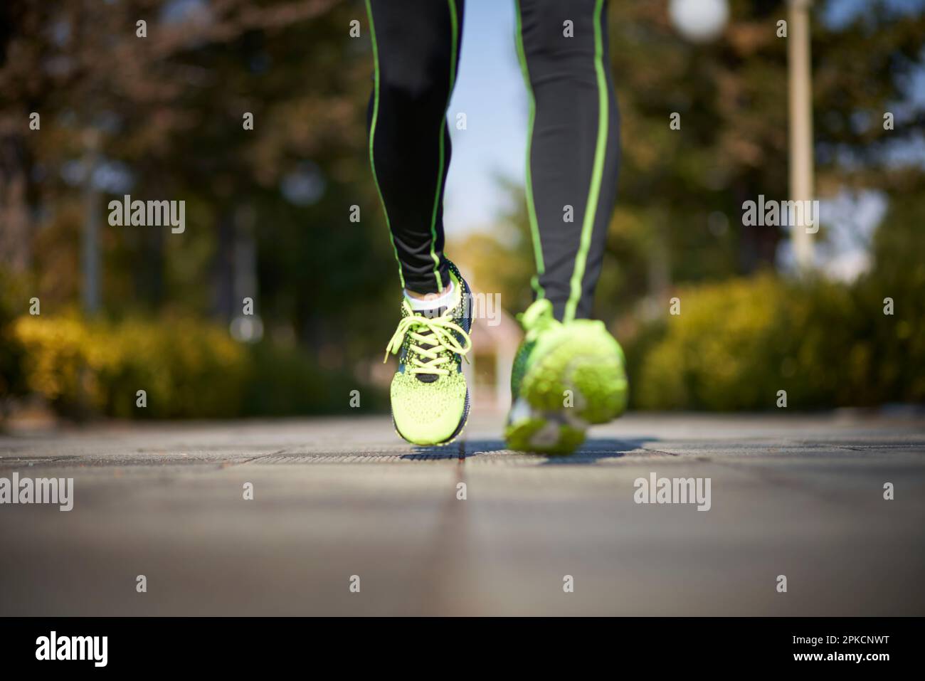 Man's feet running Stock Photo - Alamy