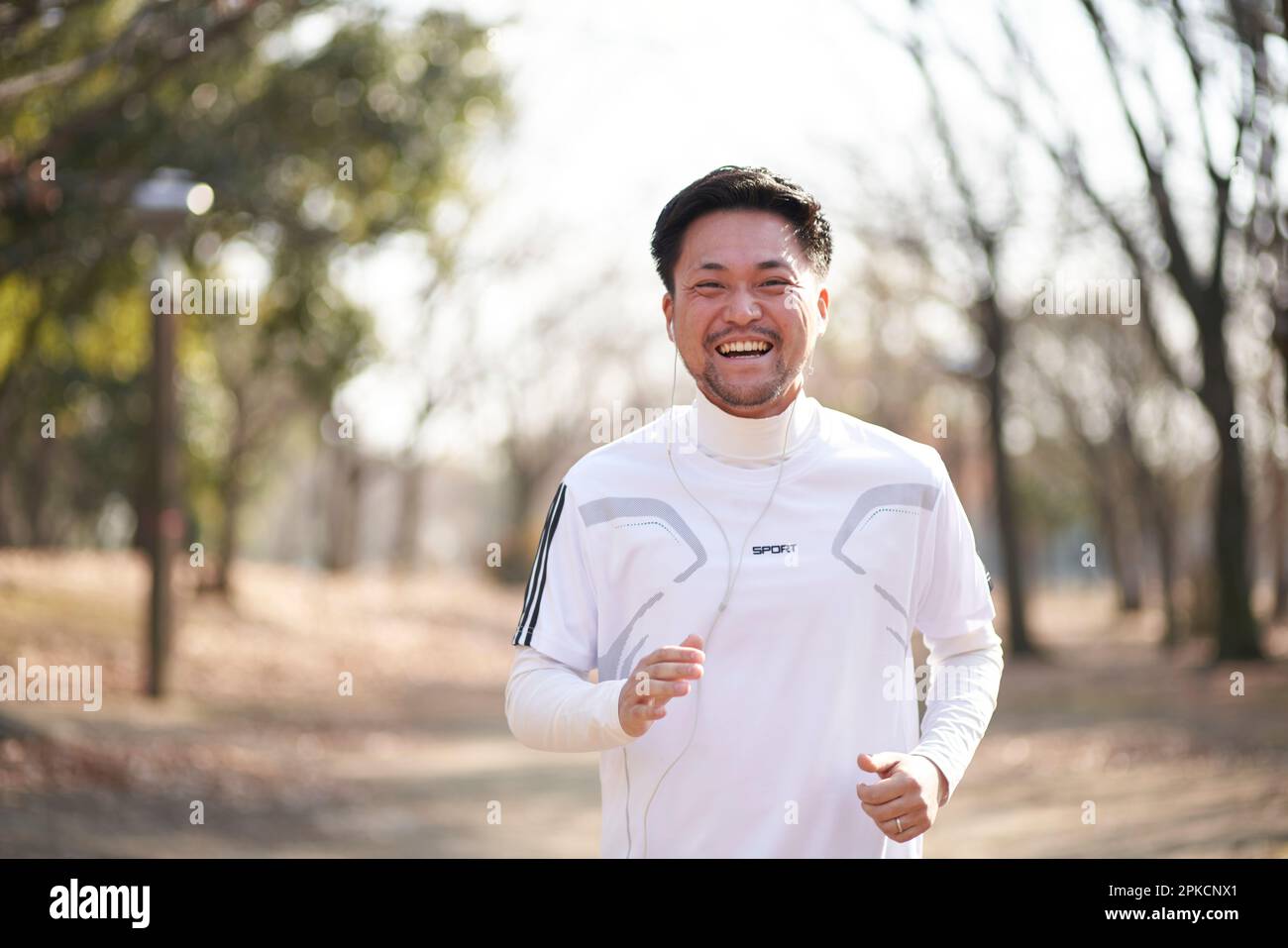 Marathon asian man running hi-res stock photography and images - Alamy