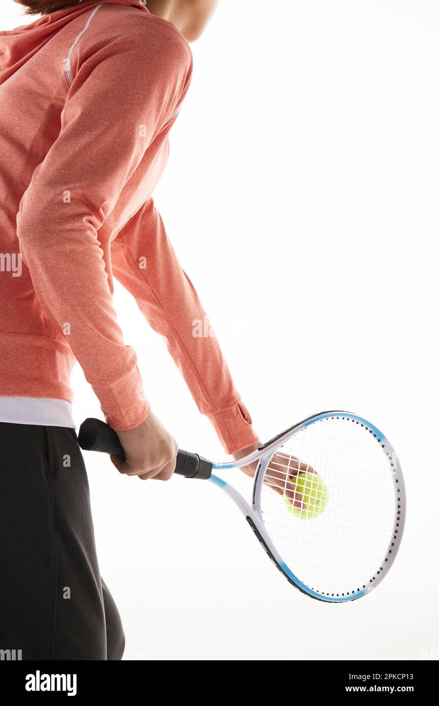 Woman Holding Racket on Serve Stock Photo - Alamy