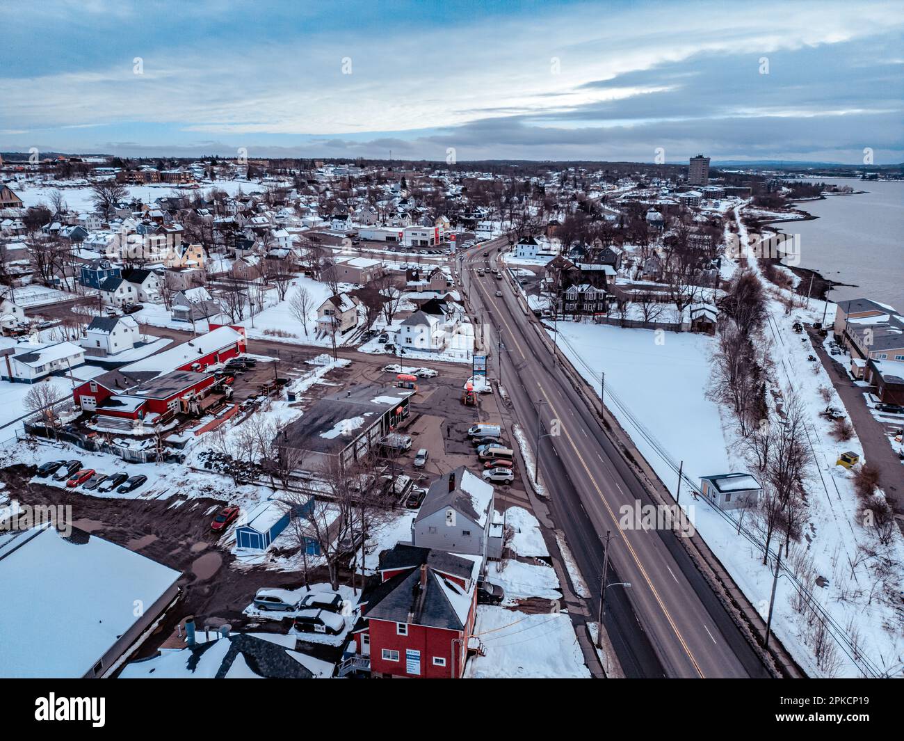 Aerial view of a bustling lakeside town near Lake Michigan, with a busy ...