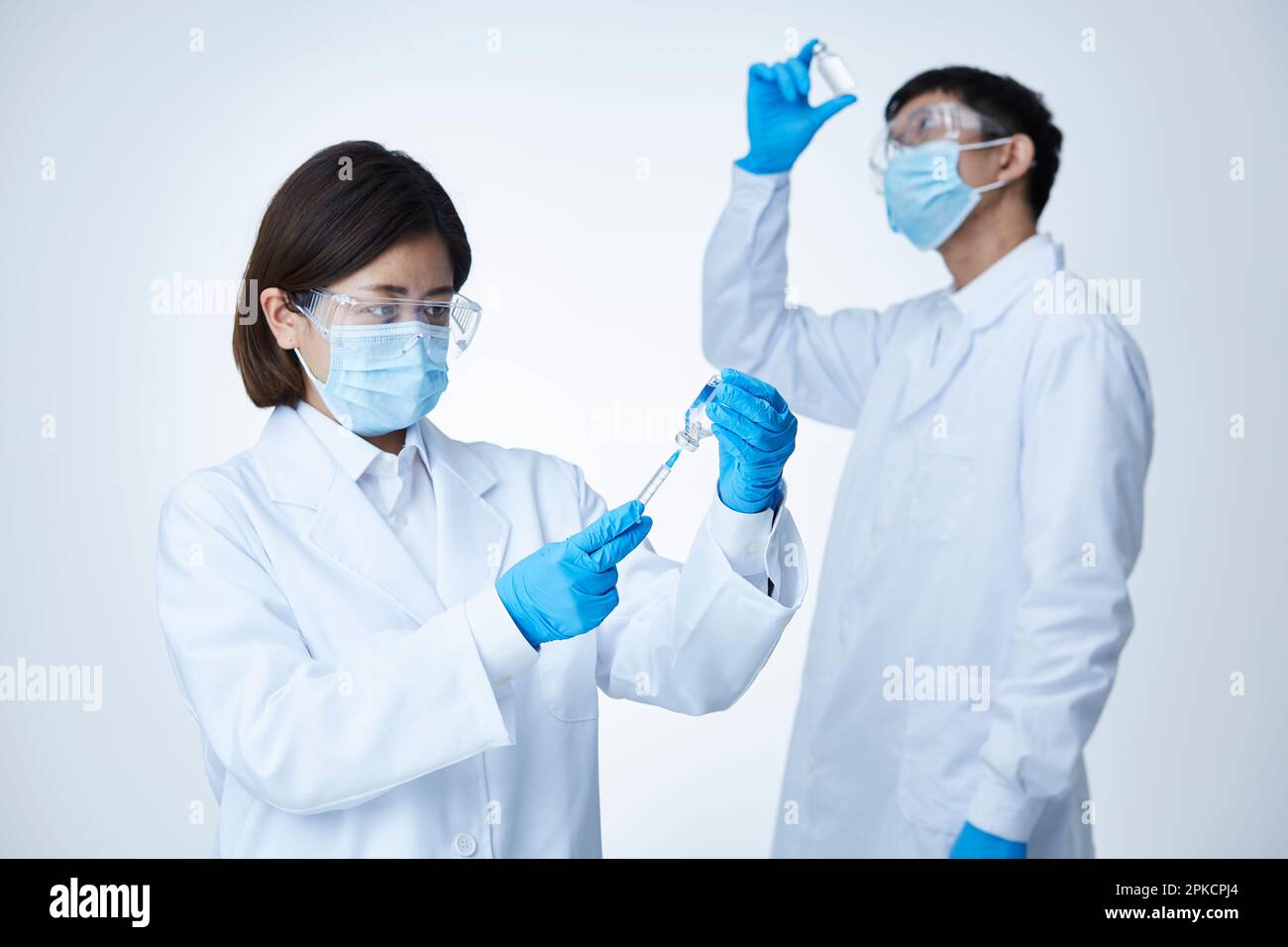 Woman in medical mask goggles hi-res stock photography and images - Alamy